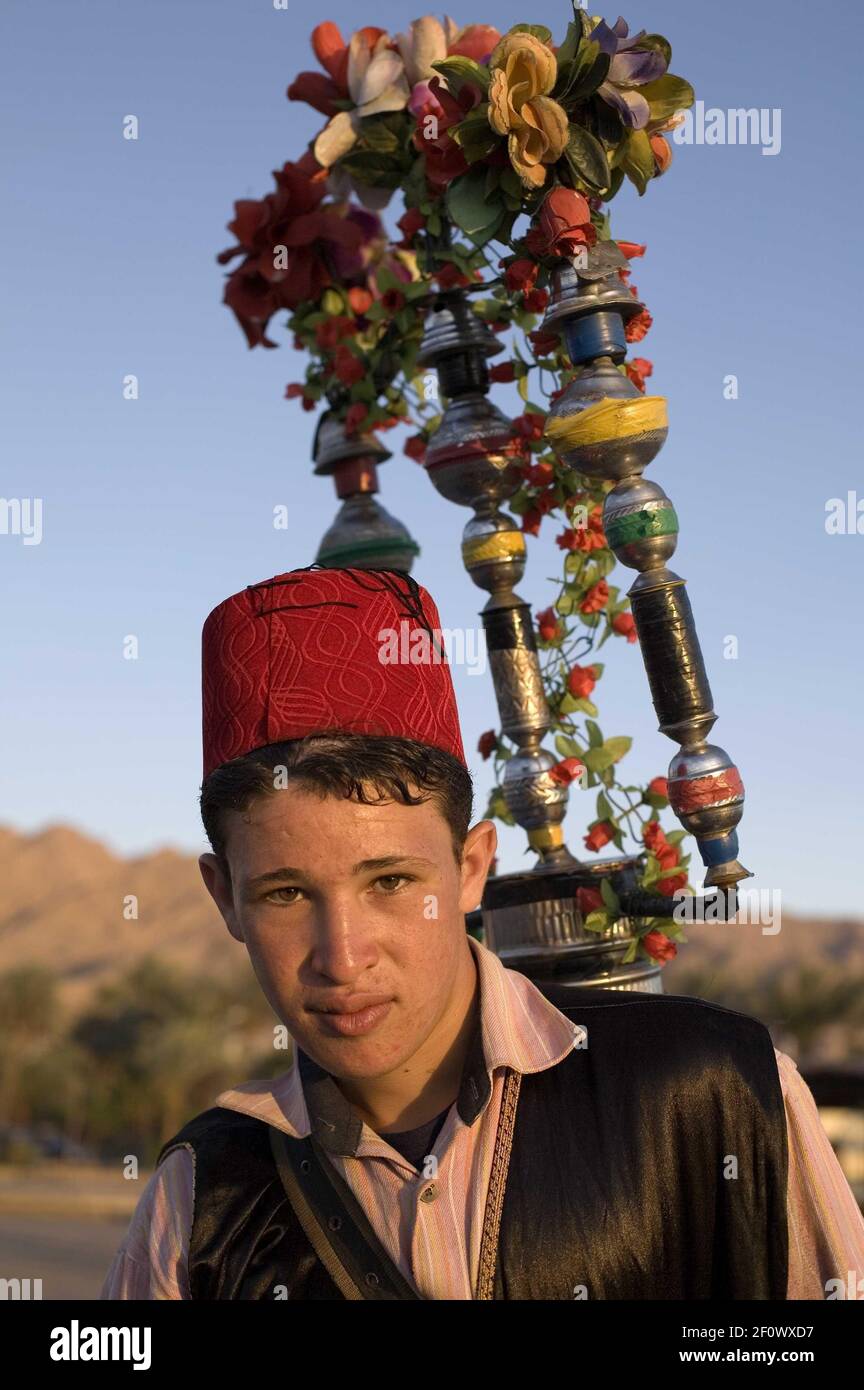 April 2008- Aqaba, Jordan- Portrait of a young boy selling tamarind ...