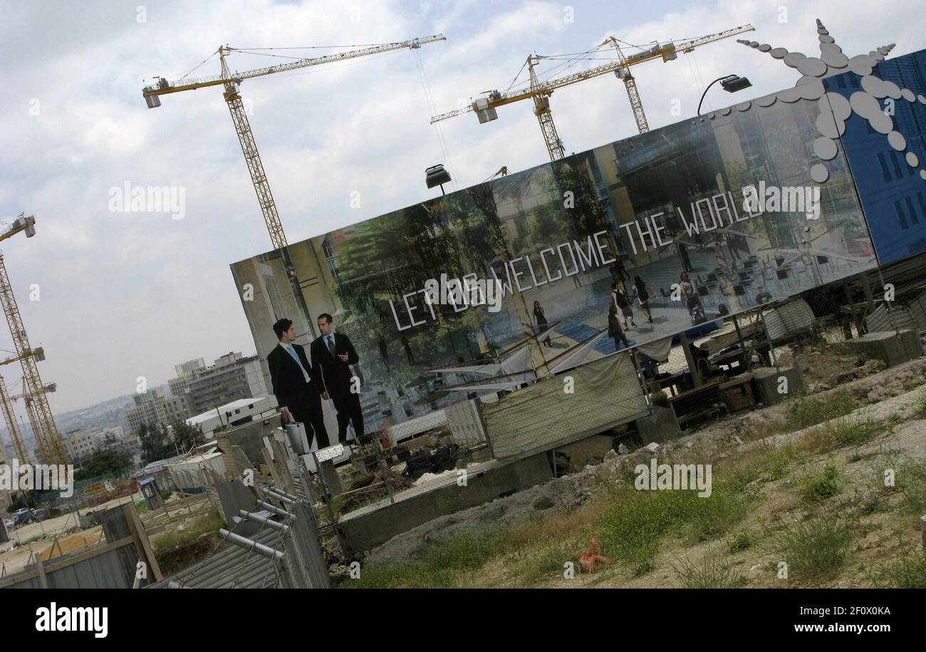 April 2008- Amman, Jordan- Cranes tower over a construction site where ...