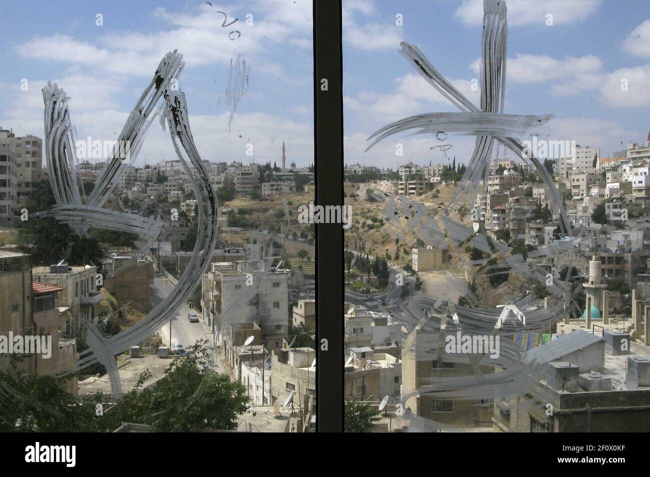 April 2008- Amman, Jordan- A view through the window of a newly ...