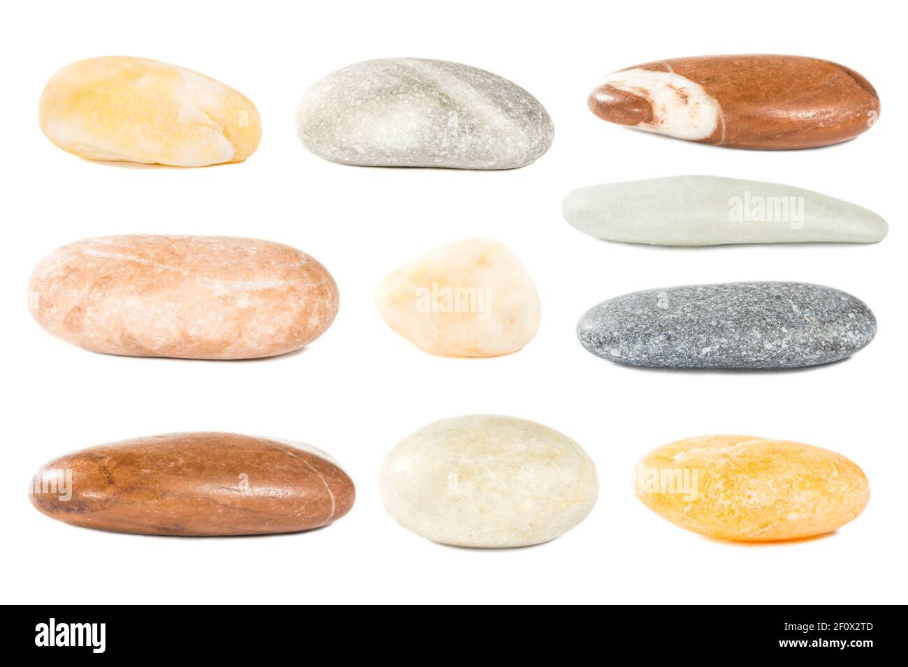 Colorful stones isolated on white background Stock Photo - Alamy