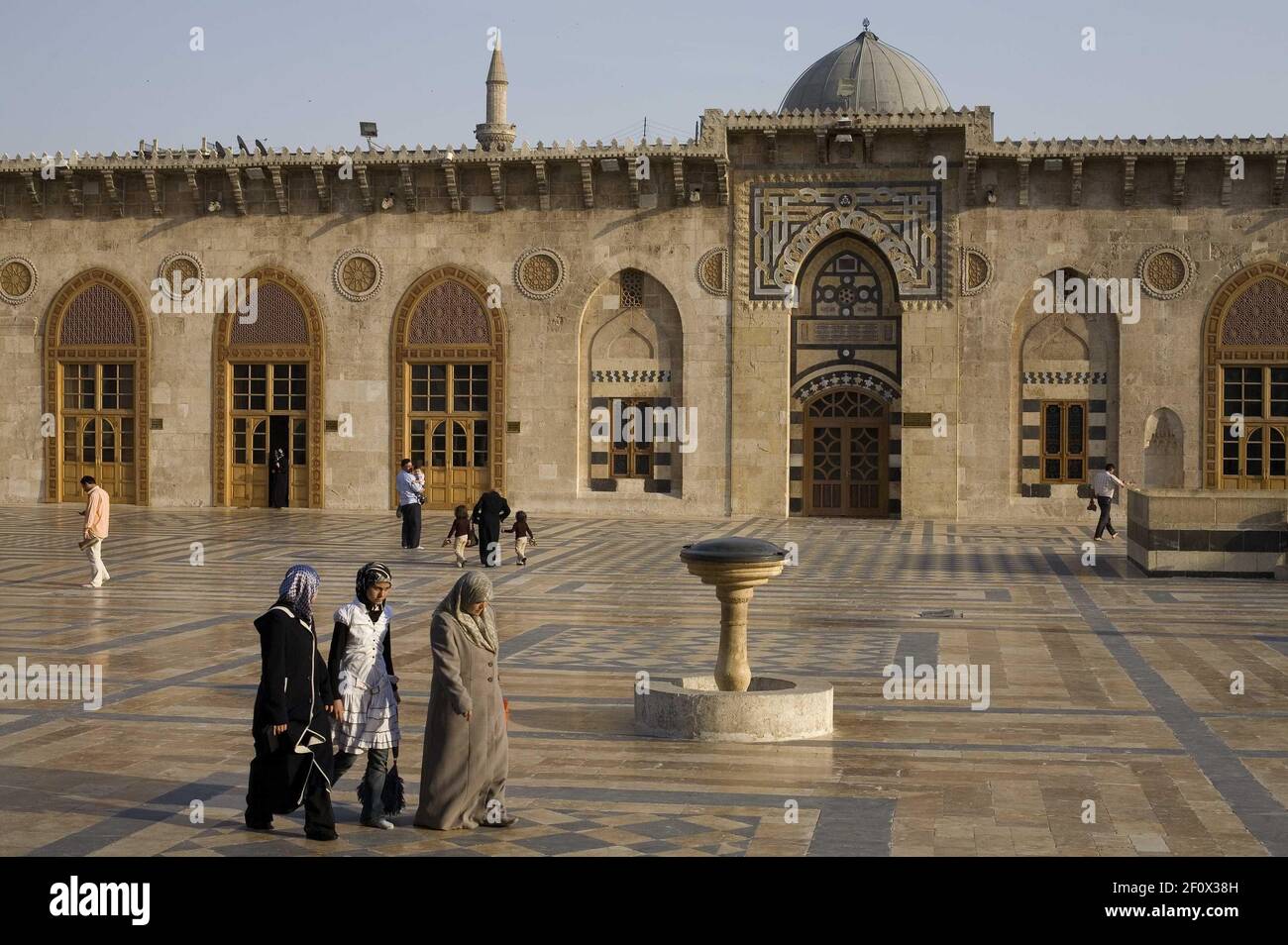 May 2008- Damascus, Syria- Visitors walk around the Great Mosque ...