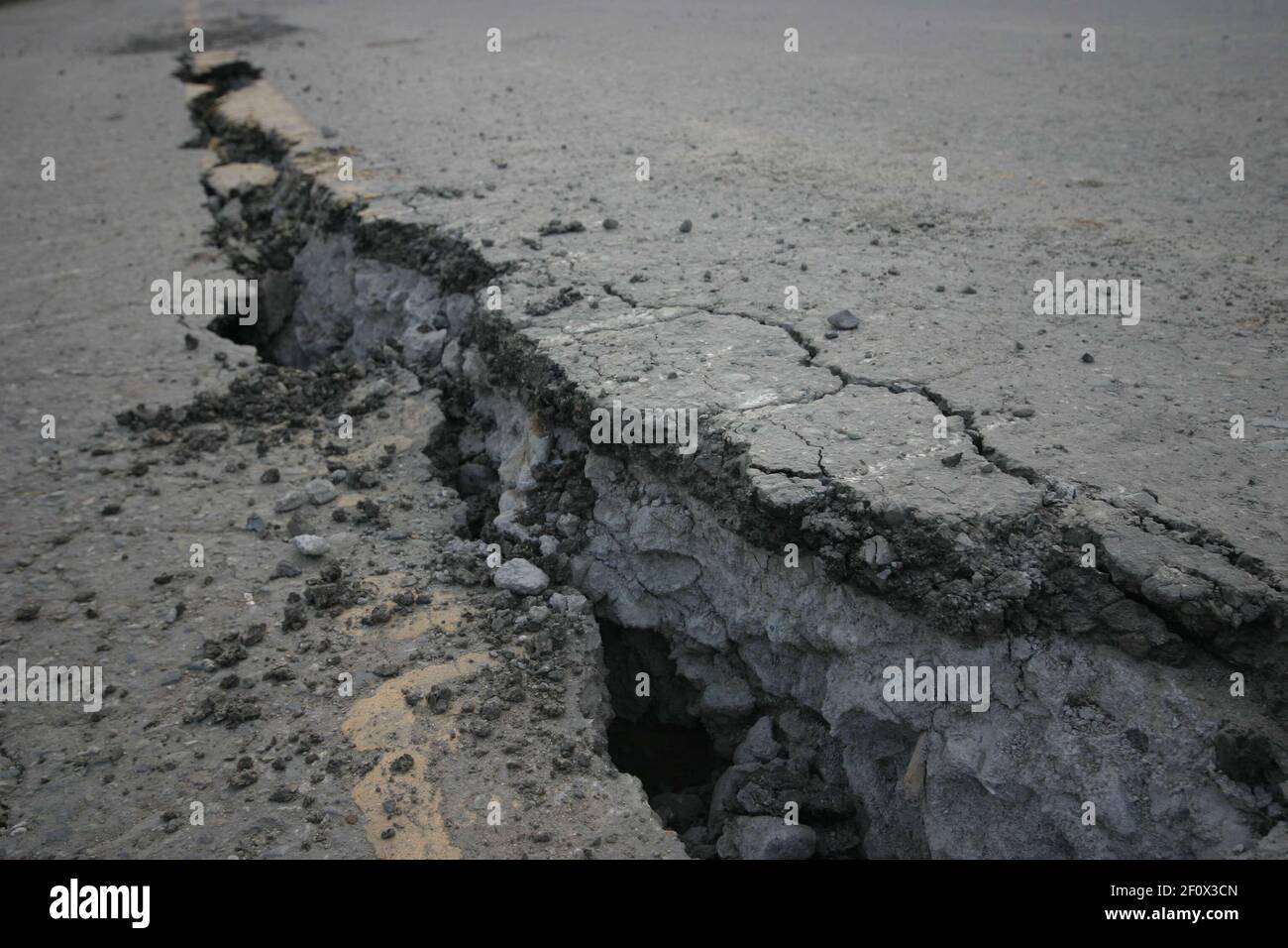 20 May 2008 - Yingxiu, China -A large break in the road leading to ...