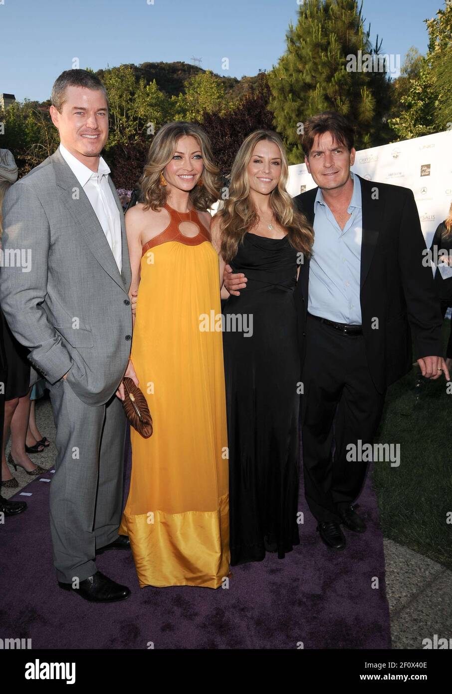 Charlie Sheen and wife Brooke Mueller with Eric Dane and wife Rebecca ...