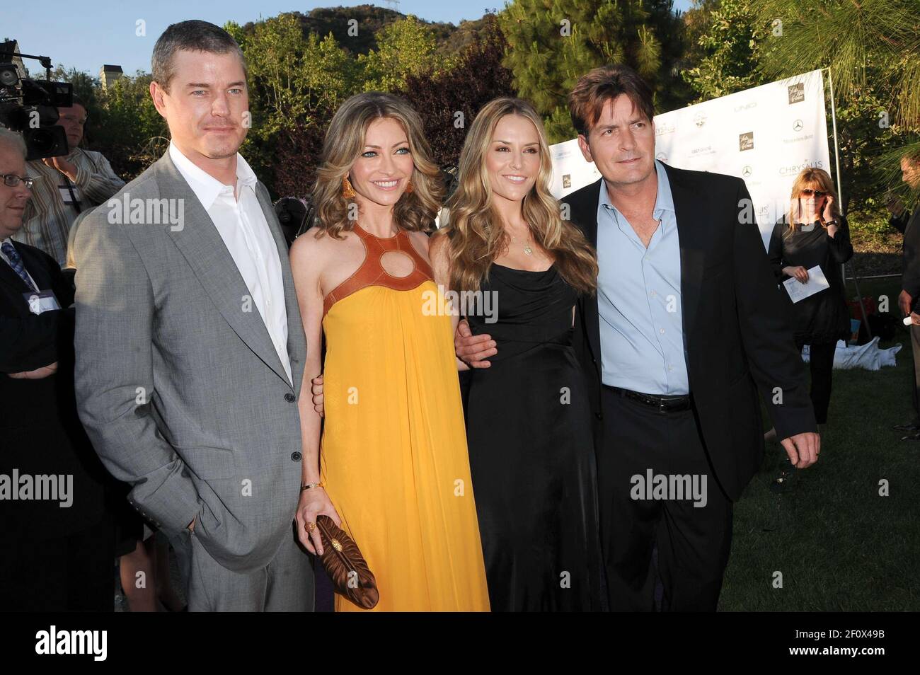 Charlie Sheen and wife Brooke Mueller with Eric Dane and wife Rebecca ...