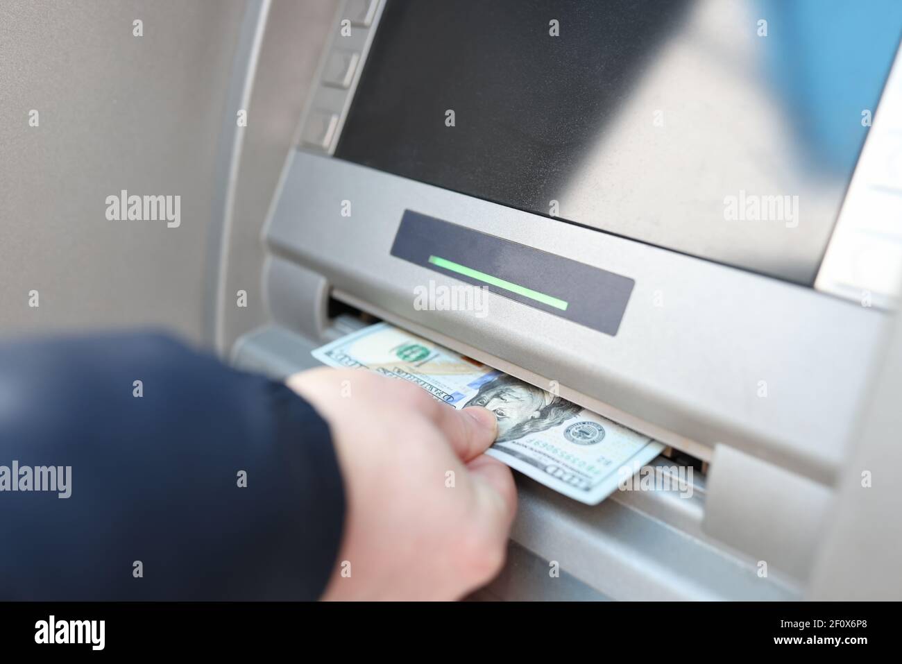 Dollar bill from cash machine hi-res stock photography and images - Alamy