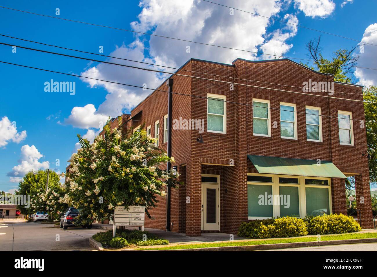 College Park, Ga / USA - 07 23 20: Brick building with green landscape ...