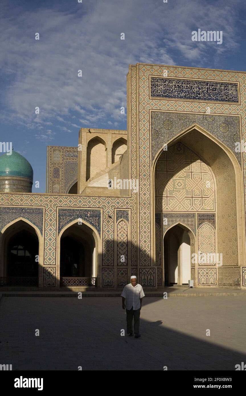 July 2008- Bukhara, Uzbekistan- A worshipper walks inside the Hoja ...