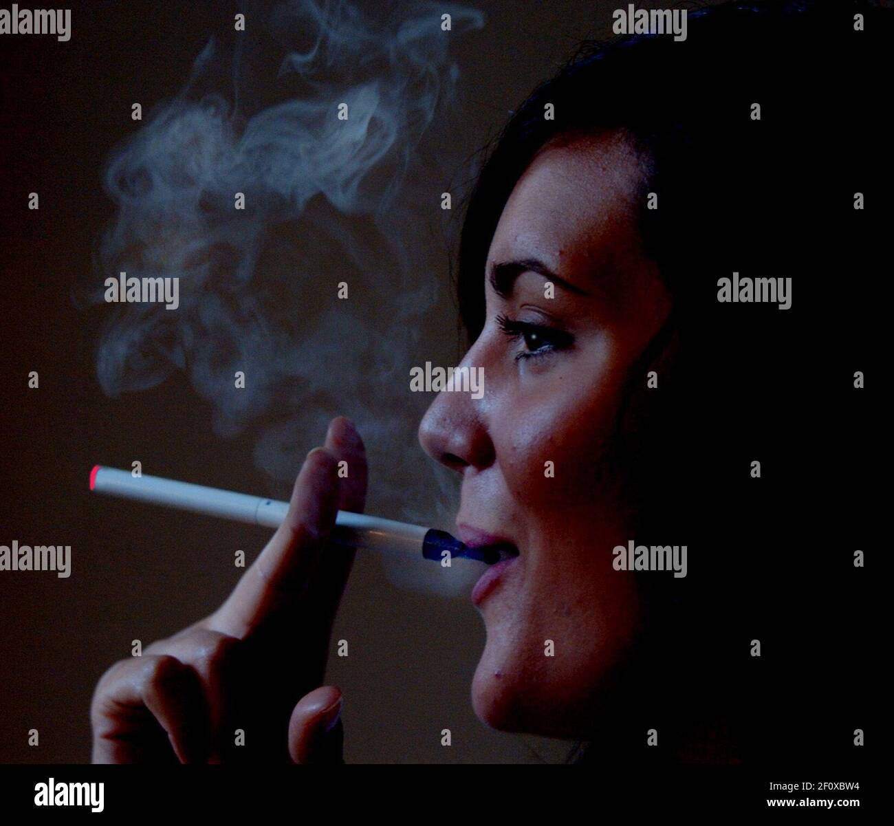 THE FIRST ELECTRIC CIGARETTE A SMOKER ENJOYS HER ELECTRIC CICARETTE PIC ...