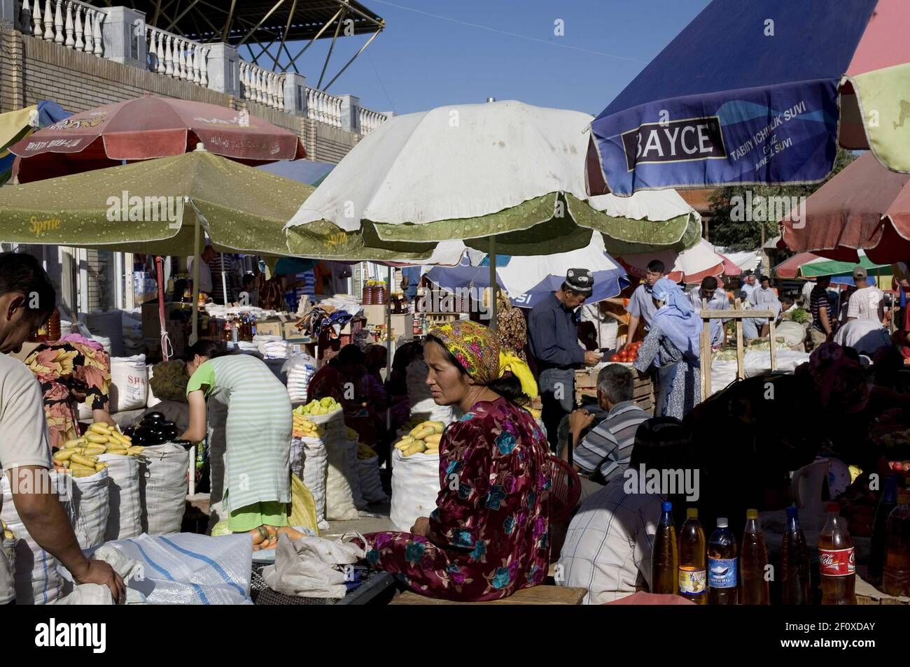 July 2008- Samarkand, Uzbekistan- Vendors prepare their stalls for the ...