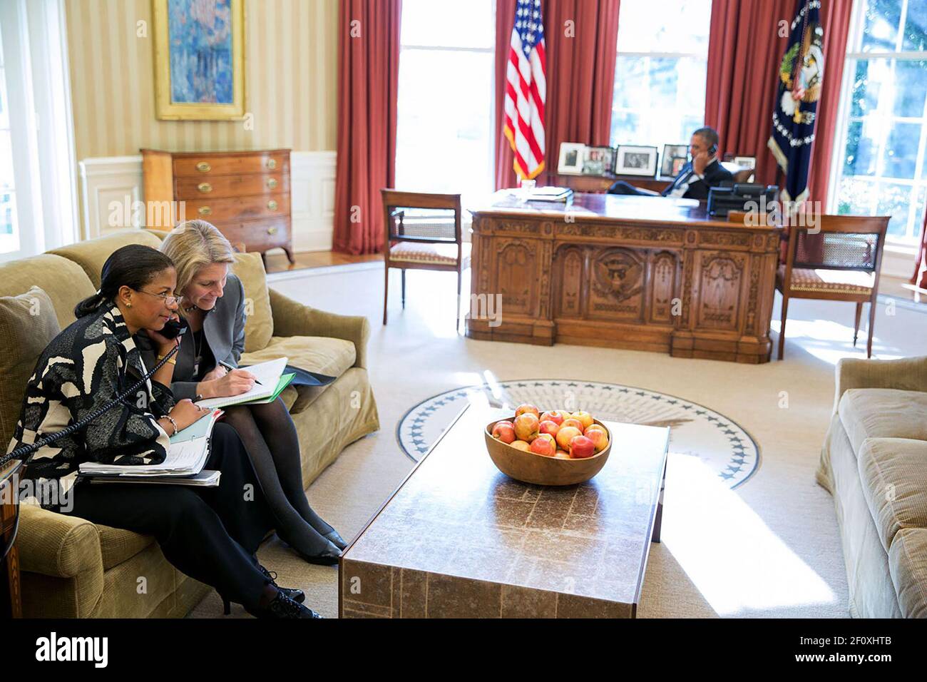President Barack Obama speaks on the phone with German Chancellor ...