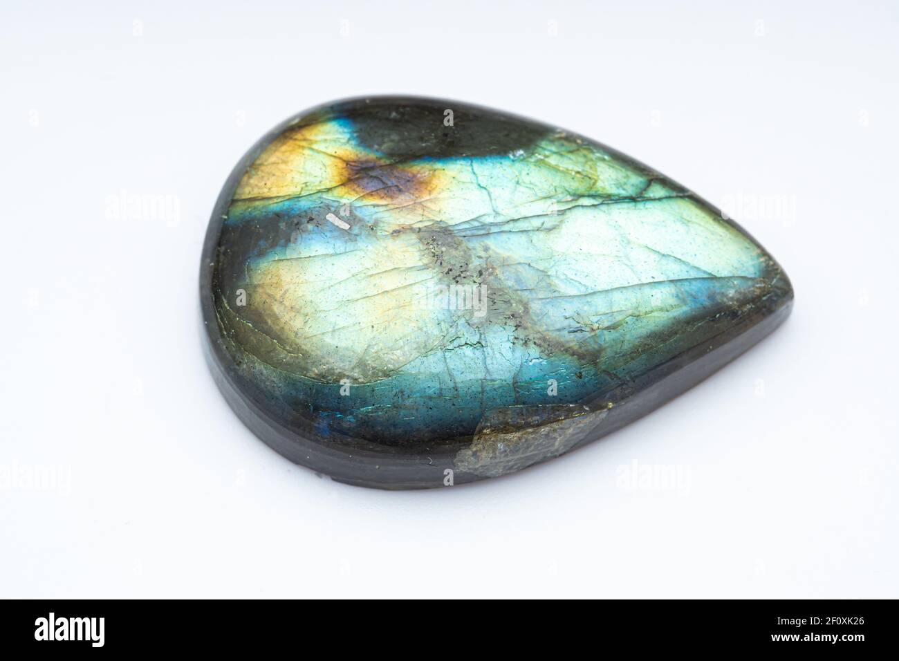 Natural stone labradorite on a white background Stock Photo - Alamy