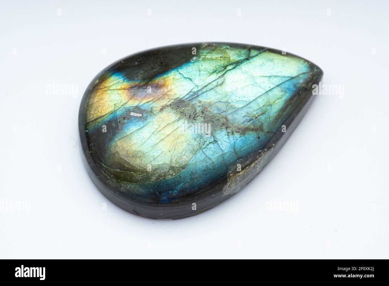 Natural stone labradorite on a white background Stock Photo - Alamy