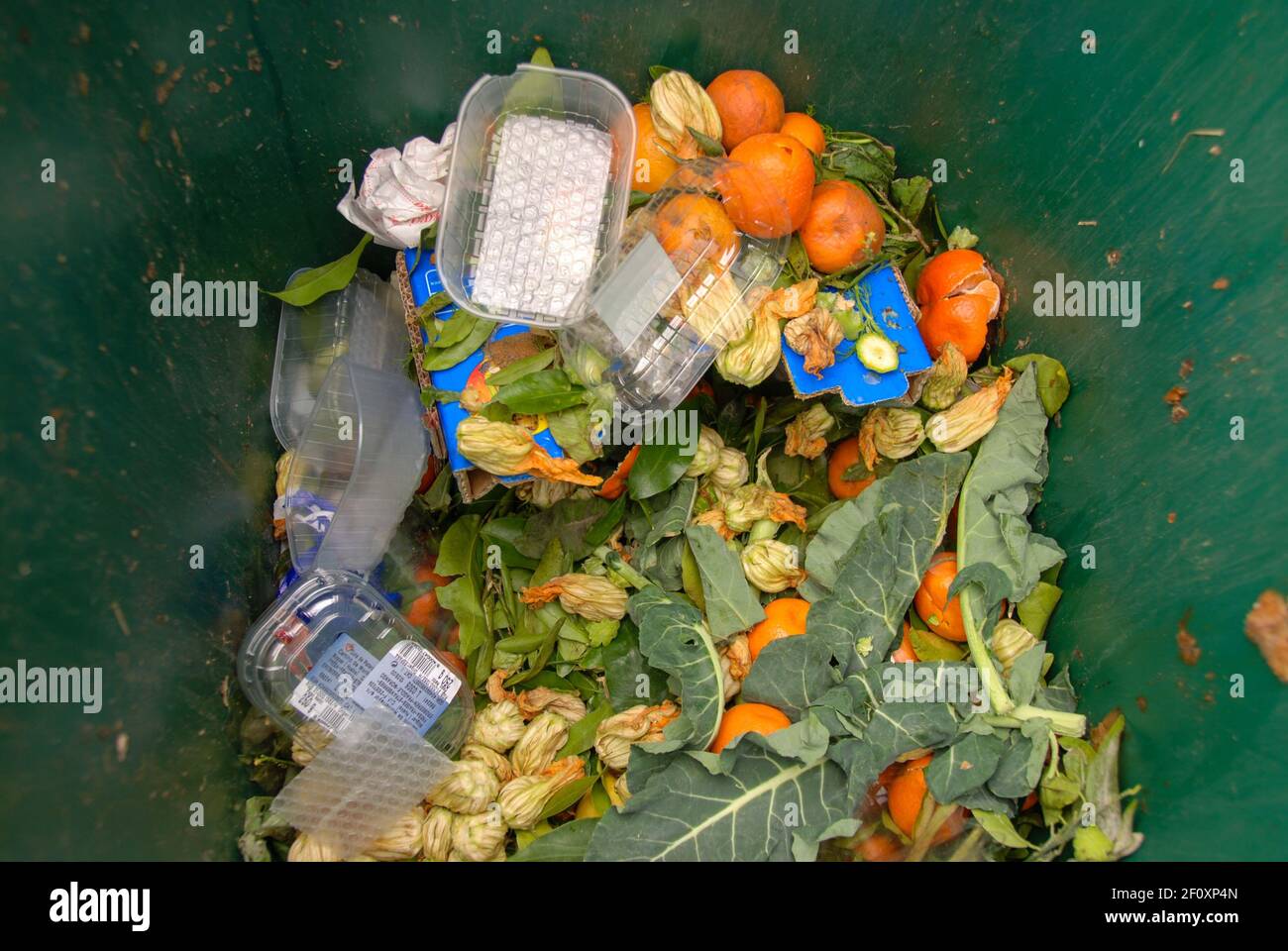 A bin with waste with food waste at the market Stock Photo - Alamy