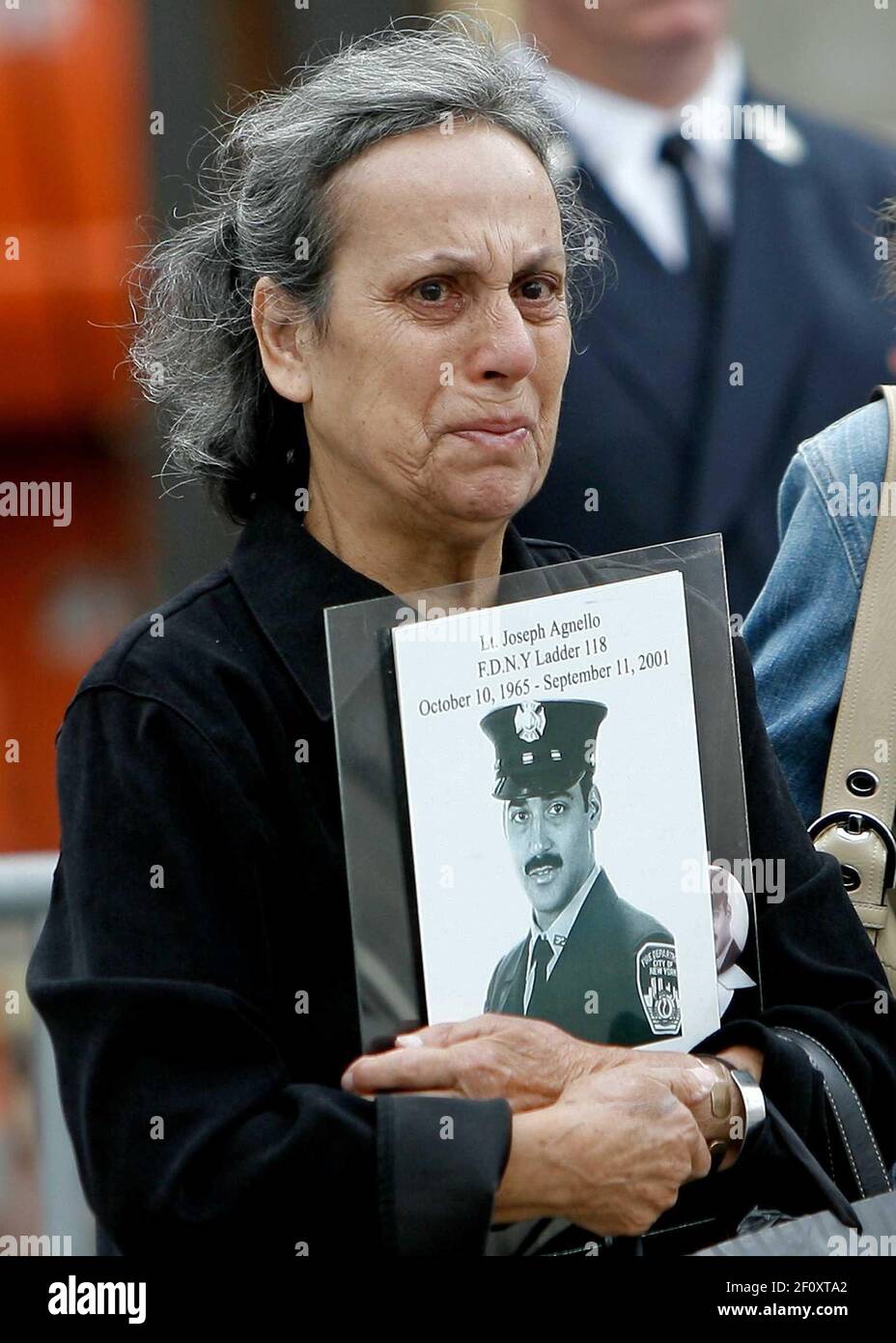 11 September 2008 - New York, NY - A family member grieves at the ...
