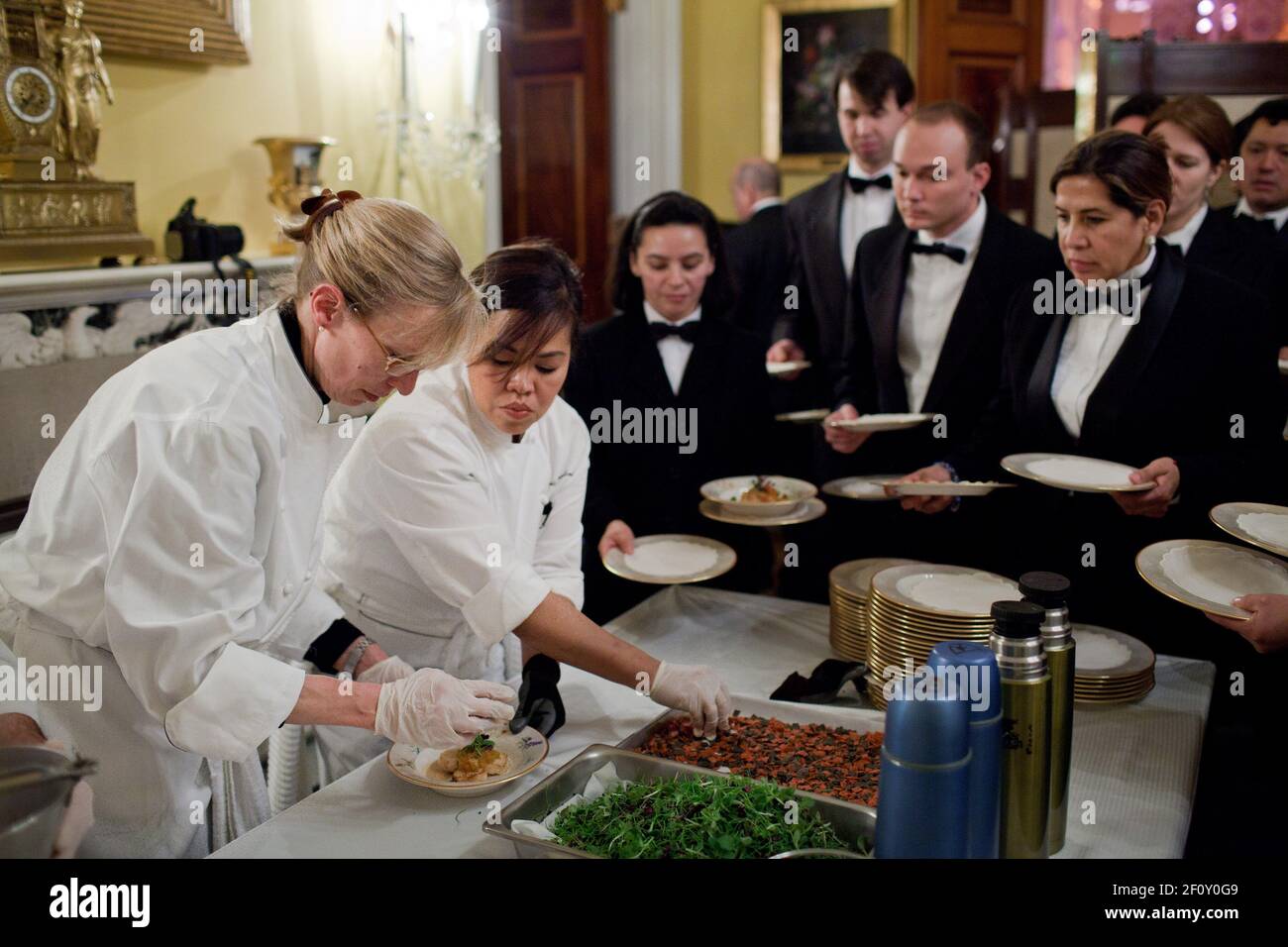 Executive Chef Cris Comerford, second left, works with staff in the Old ...