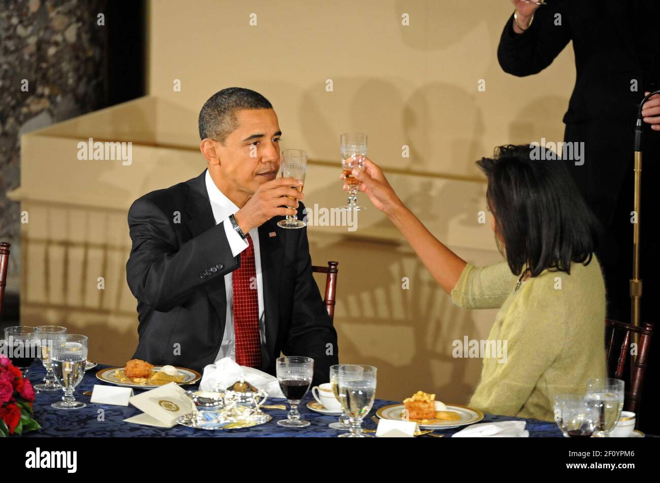 20 January 2009 - Washington, DC - Barack and Michelle Obama toast ...