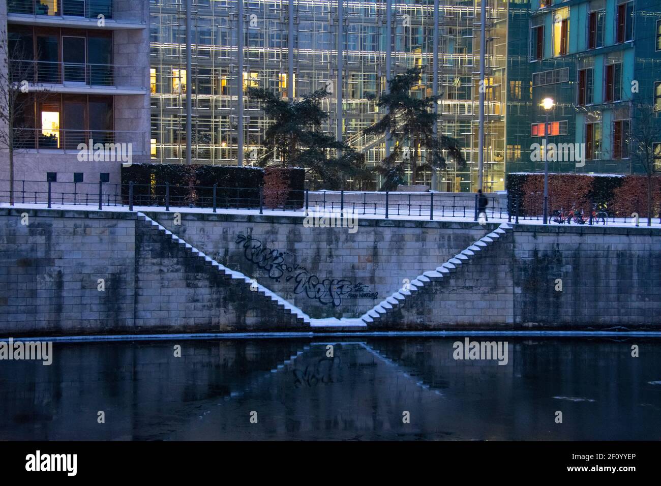 Snow covered steps leading to the Spree river in Mitte Berlin Stock ...