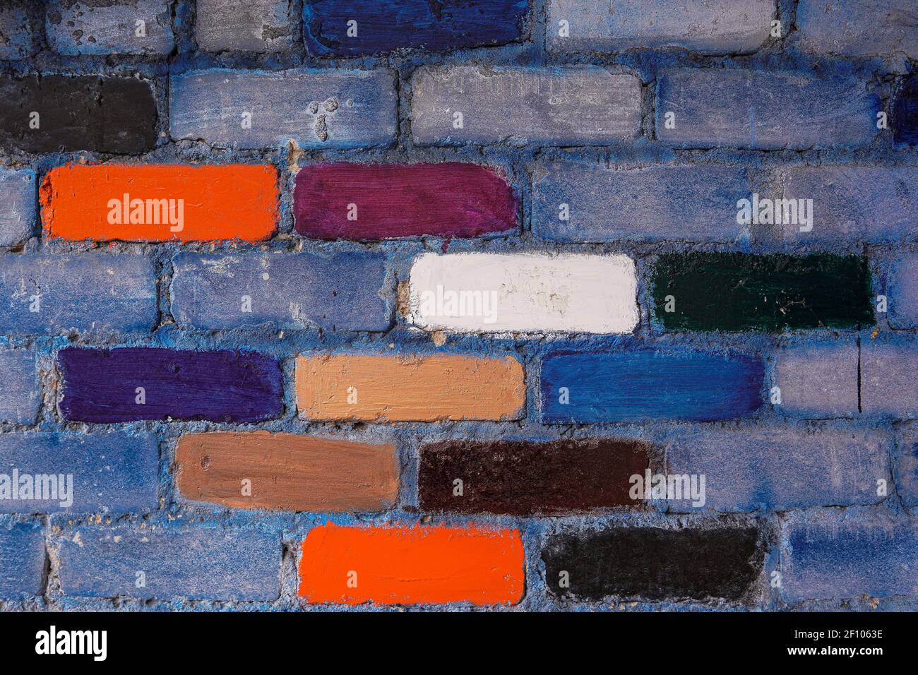 Rainbow colourful brick wall background. brick wall texture with ...