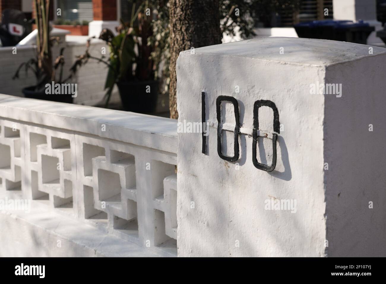 house number 100 Stock Photo - Alamy