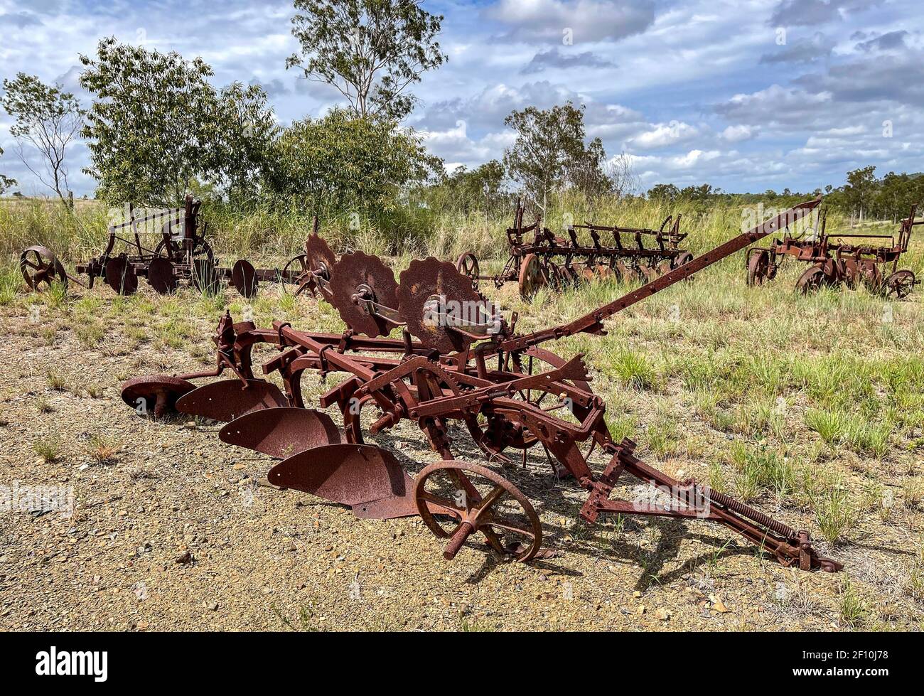 Old rusty 3 point furrow mouldboard plough in the field of a farm Stock ...