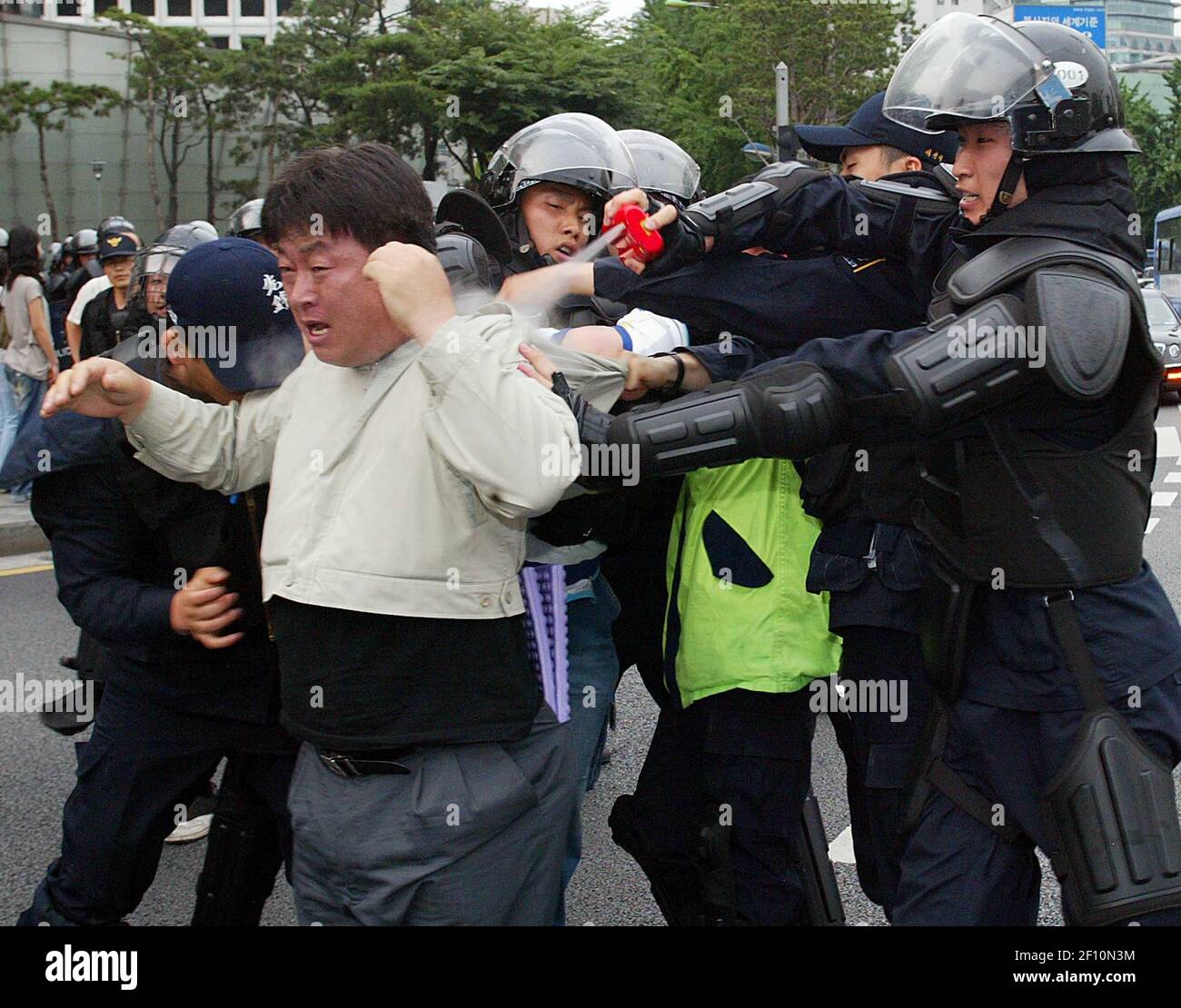 19 June 2009 - Seoul, South Korea - South Korean riot police arrest a ...