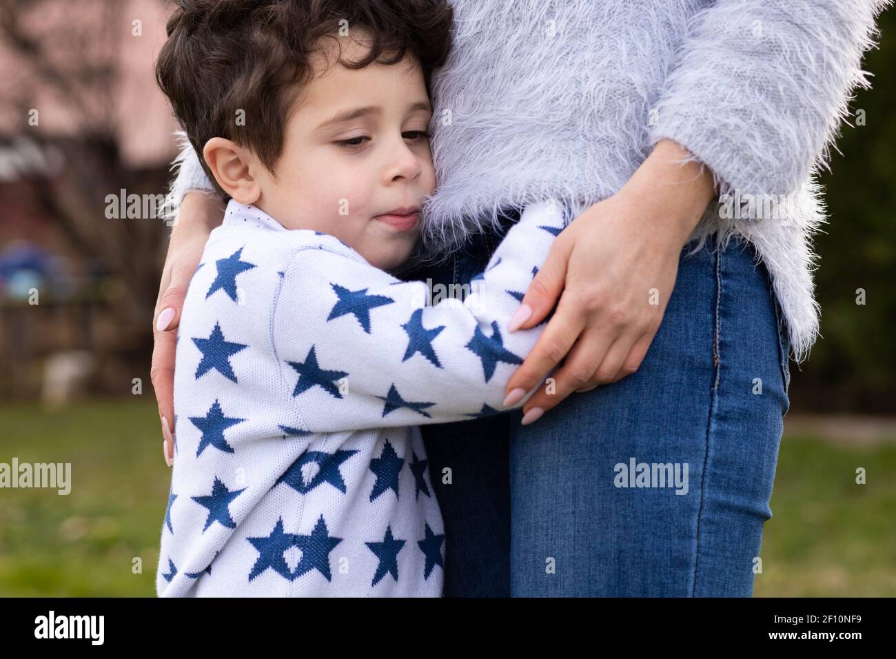 Mother and boy hugging hi-res stock photography and images - Alamy