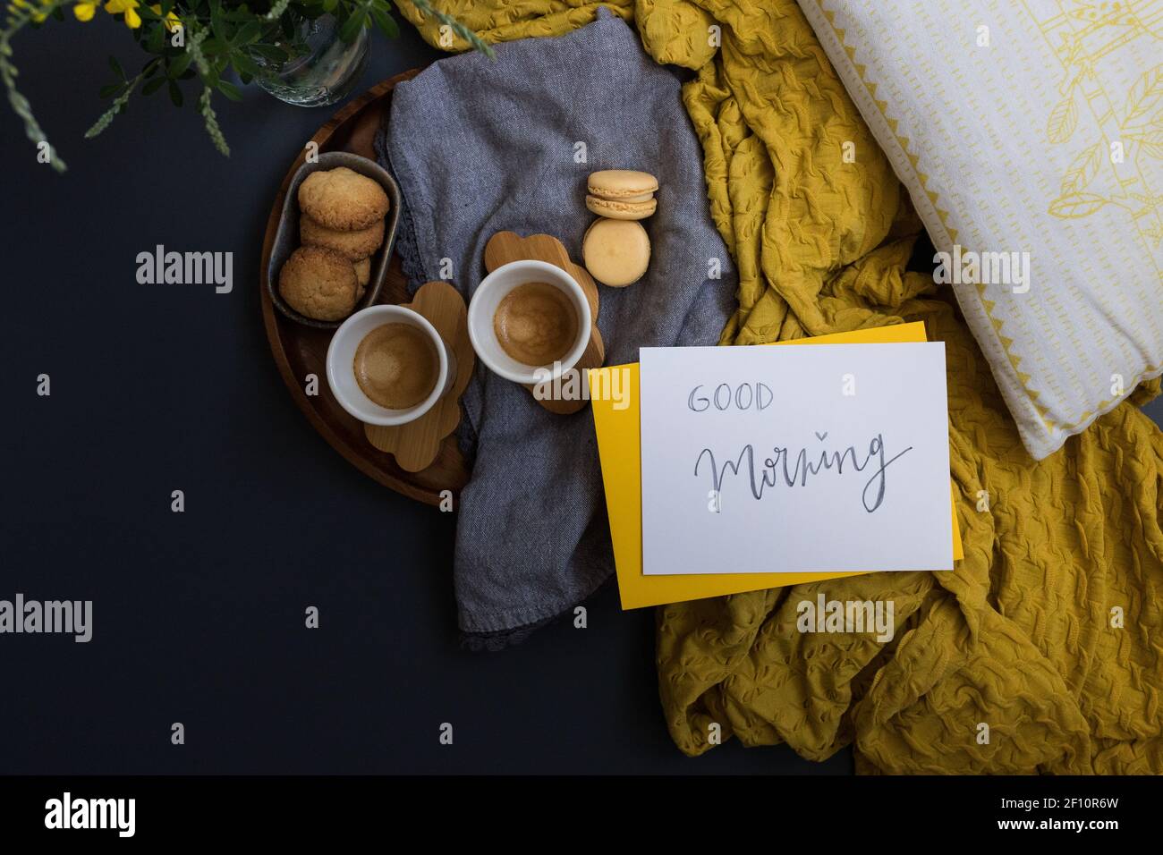 Happy message over a yellow closed envelope next to a romantic couple ...