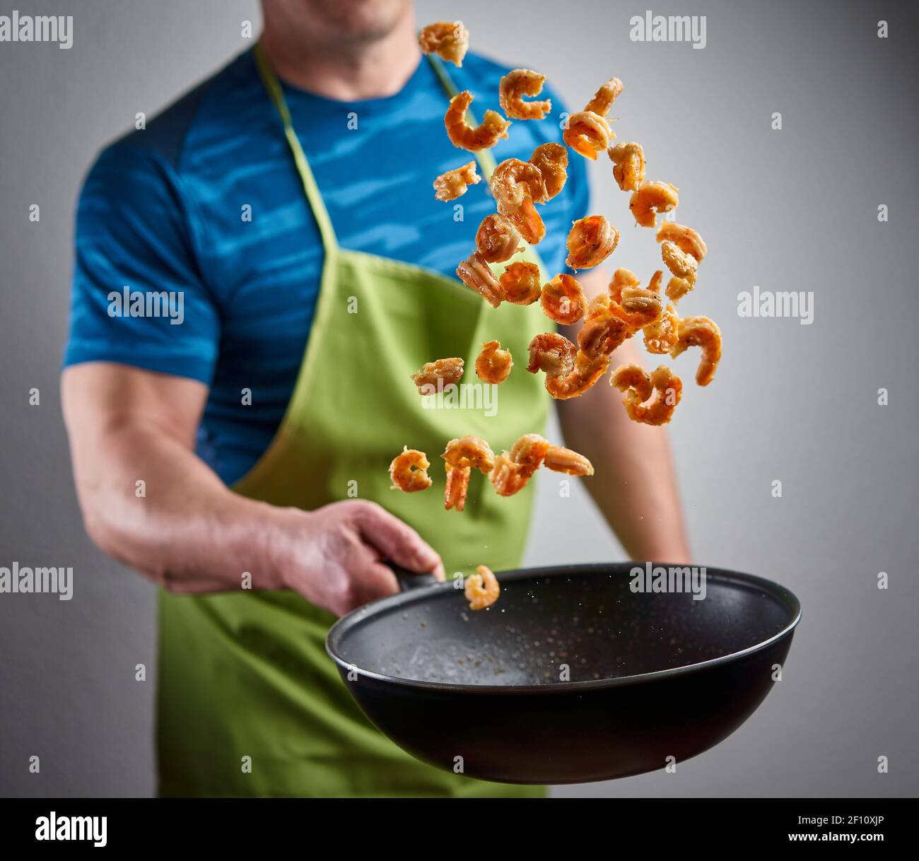 Wok throwing hi-res stock photography and images - Alamy