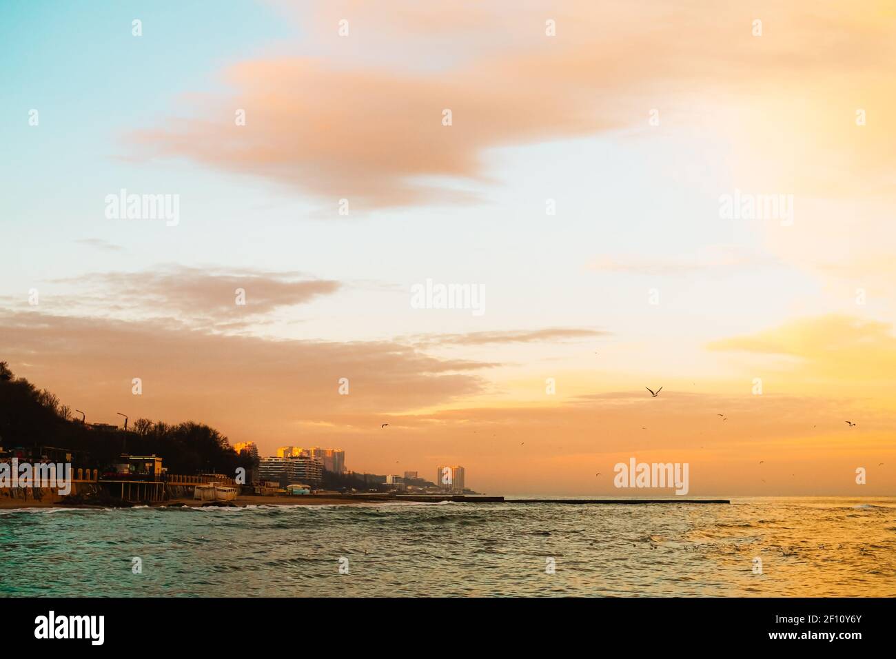 Photo of beautiful orange sunset on the sea, silhouette of lebanese ...