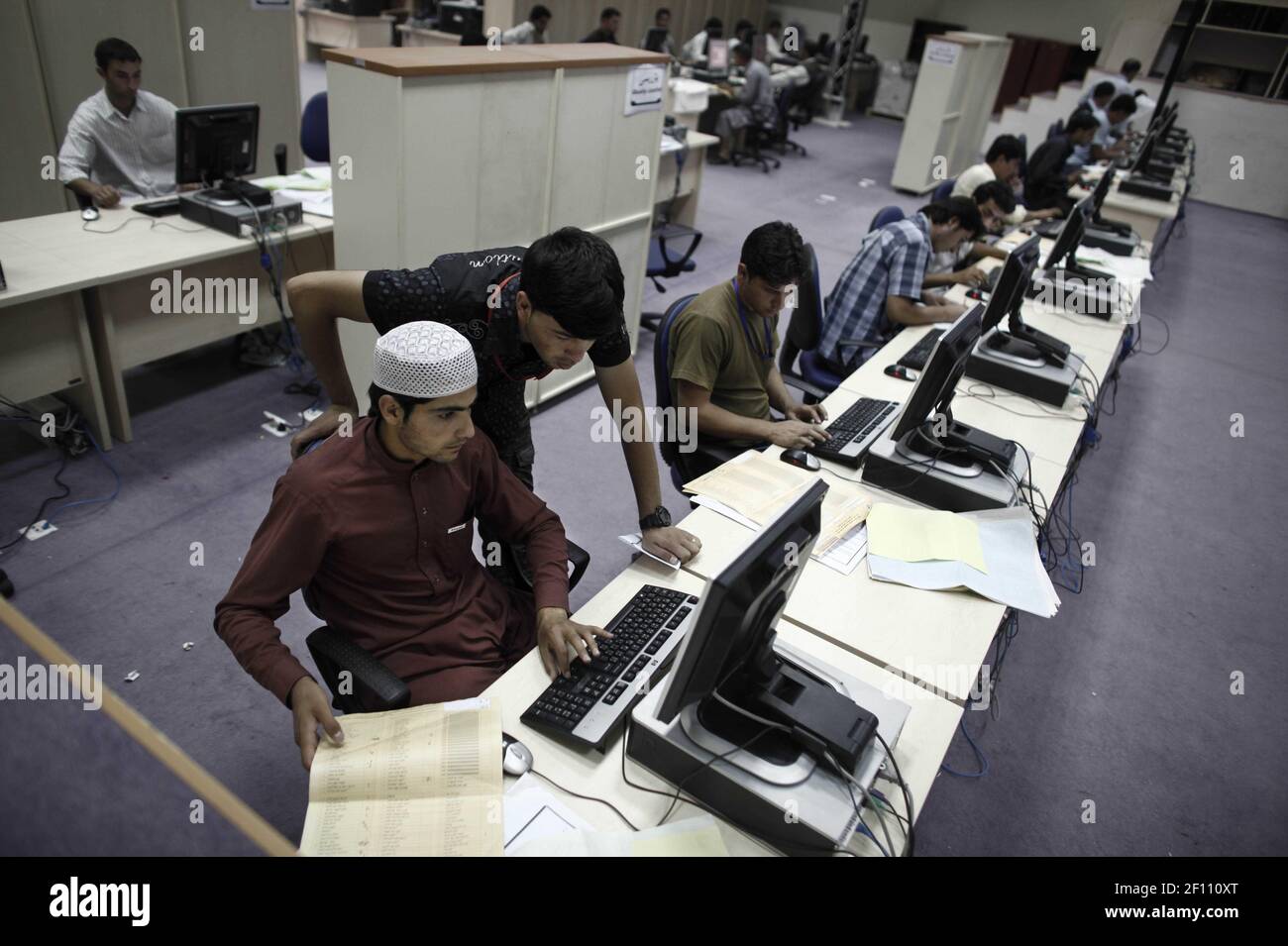 24 August 2009 - Kabul, Afghanistan - People count ballots from the ...