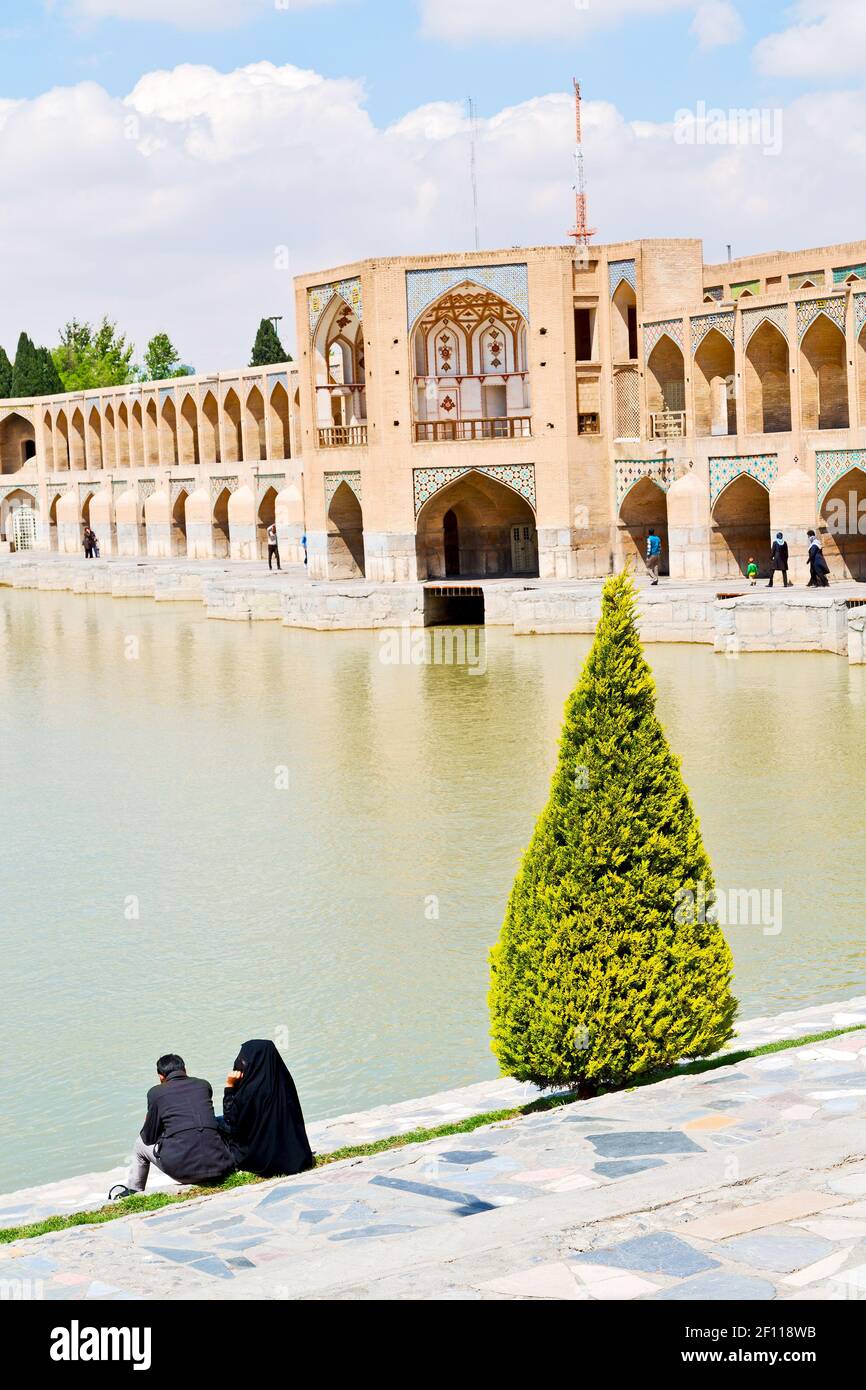 In iran the old bridge and the river Stock Photo - Alamy