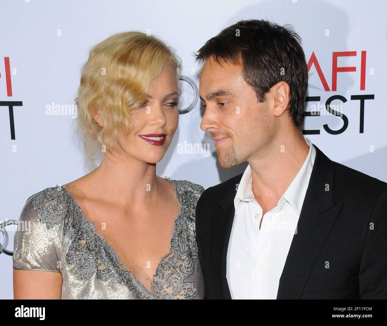 Charlize Theron and Stuart Townsend. 4 November 2009, Hollywood, CA ...
