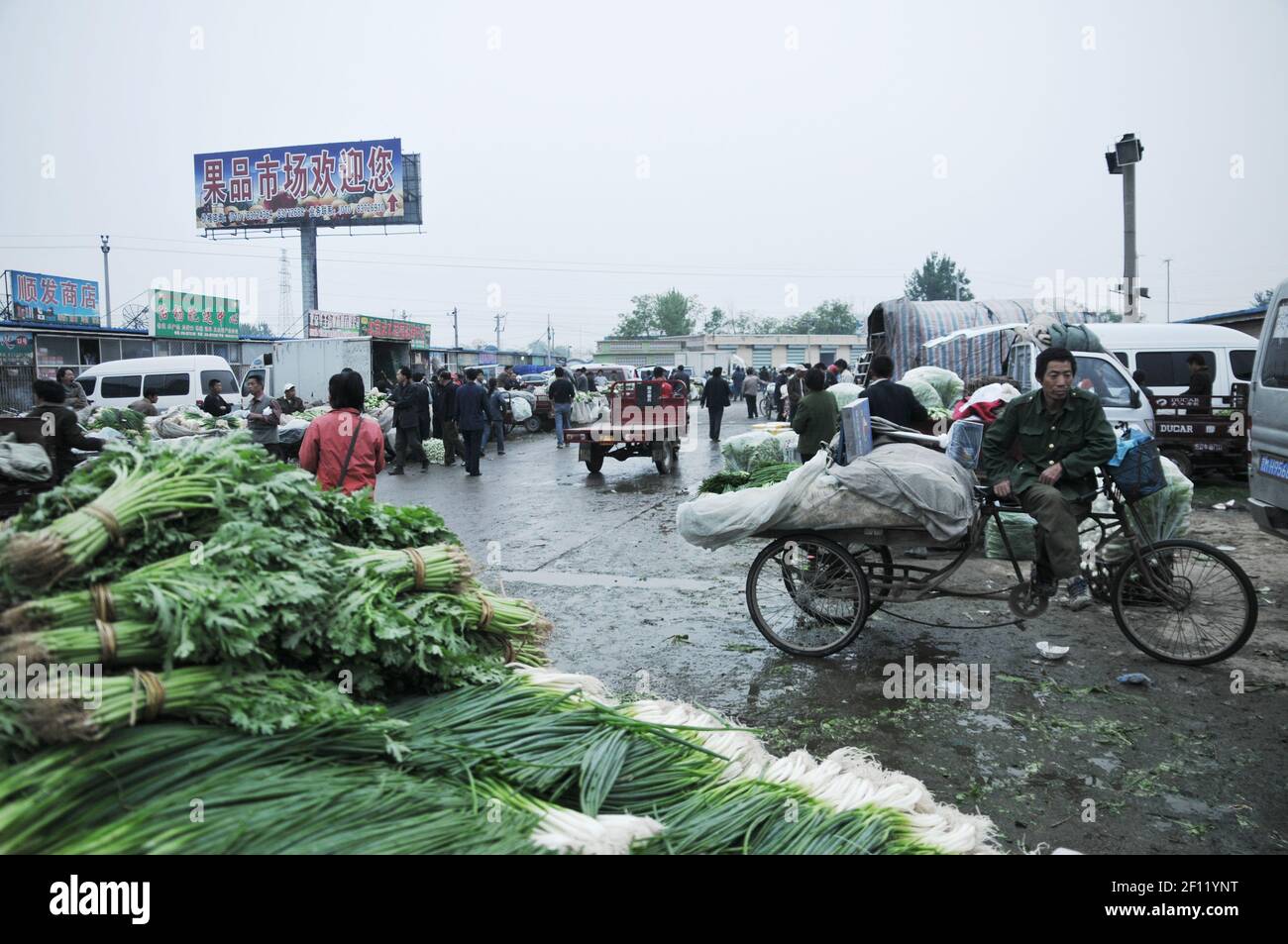A three wheeled carrier is waiting for clients. (Photo by Raphael ...
