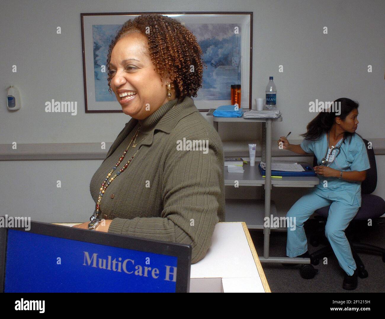 Rita Wilson, nurse manager in the Progressive Care Unit, talks with the ...