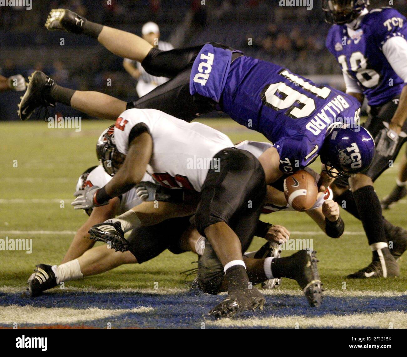 Texas Christian quarterback Jeff Ballard (16) scores on a keeper in the ...