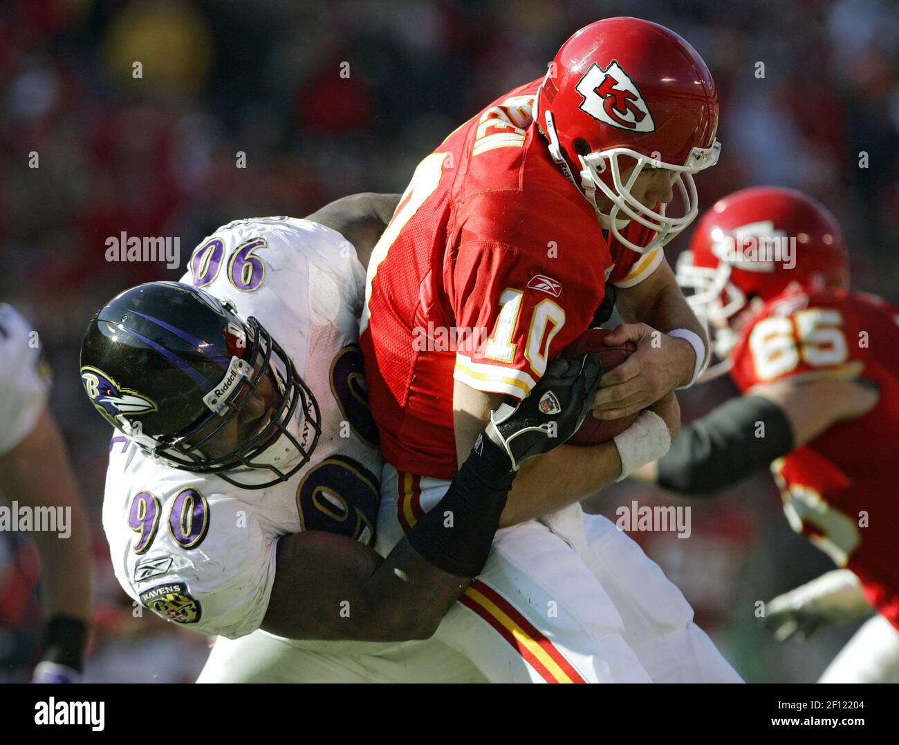 Baltimore Ravens defensive end Trevor Pryce (90) sacks Kansas City ...