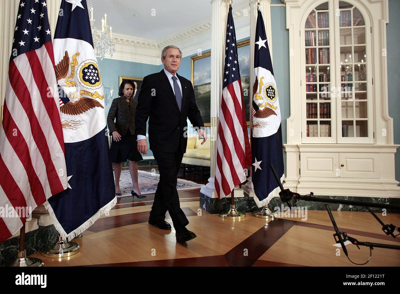 President George Bush, accompanied by Secretary of State Condoleezza ...