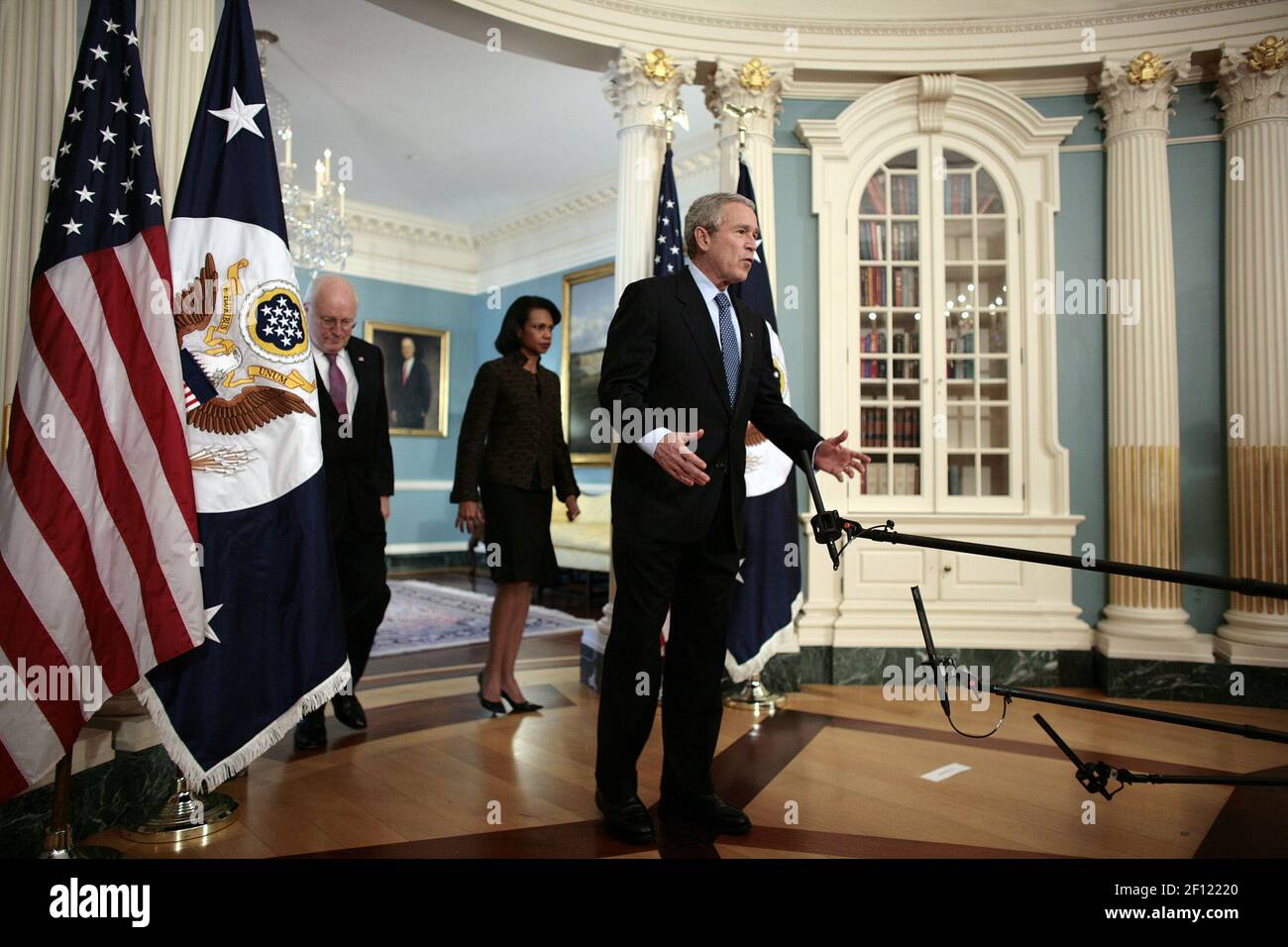 President George Bush, accompanied by Secretary of State Condoleezza ...