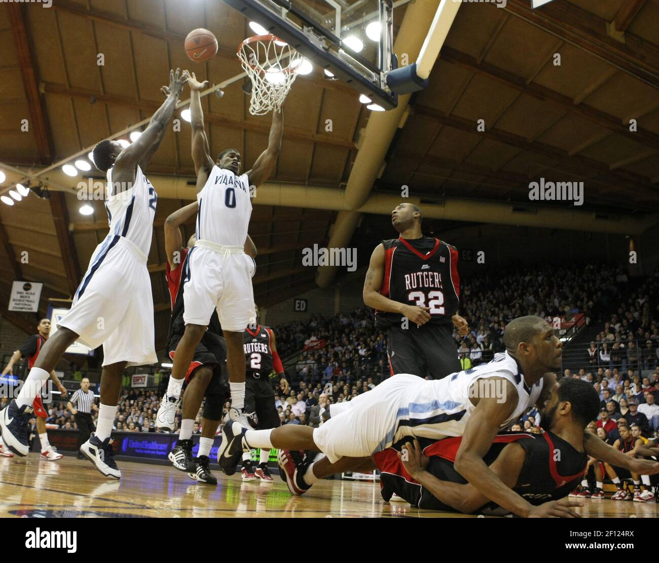 Villanova's Dwayne Anderson crashes onto Rutgers Earl Pettis, on the ...
