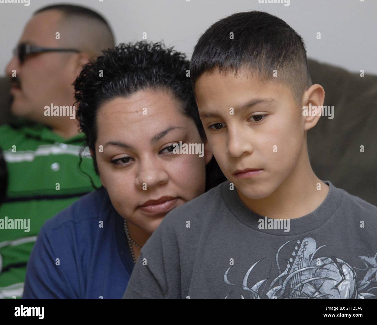 Veronica Sanchez, sits with her son, Gabe Sanchez, 12, who was born ...