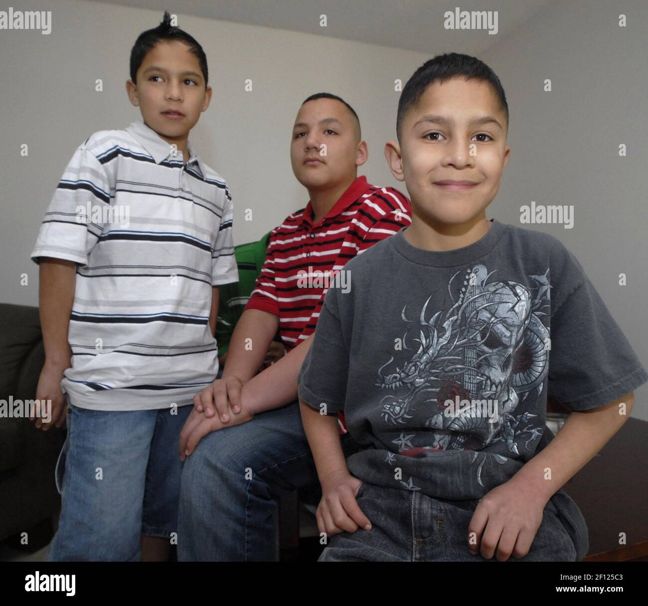 From left, Izzy, Frank and Gabe Sanchez are triplets. The smaller ...