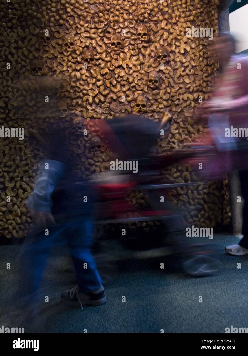 A recreation of a Paris catacomb displays the numbers of people lost to ...
