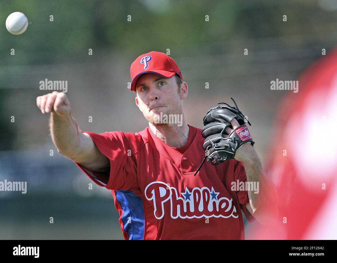 Philadelphia Phillies pitcher Brad Lidge runs drills during opening day ...