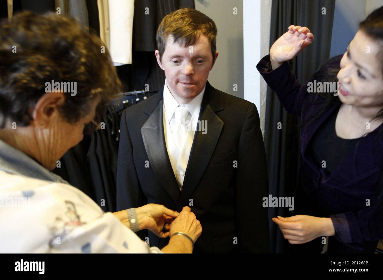 Lois Nardone, far left, and Jean Henson, far right, help Ron Bahr try ...