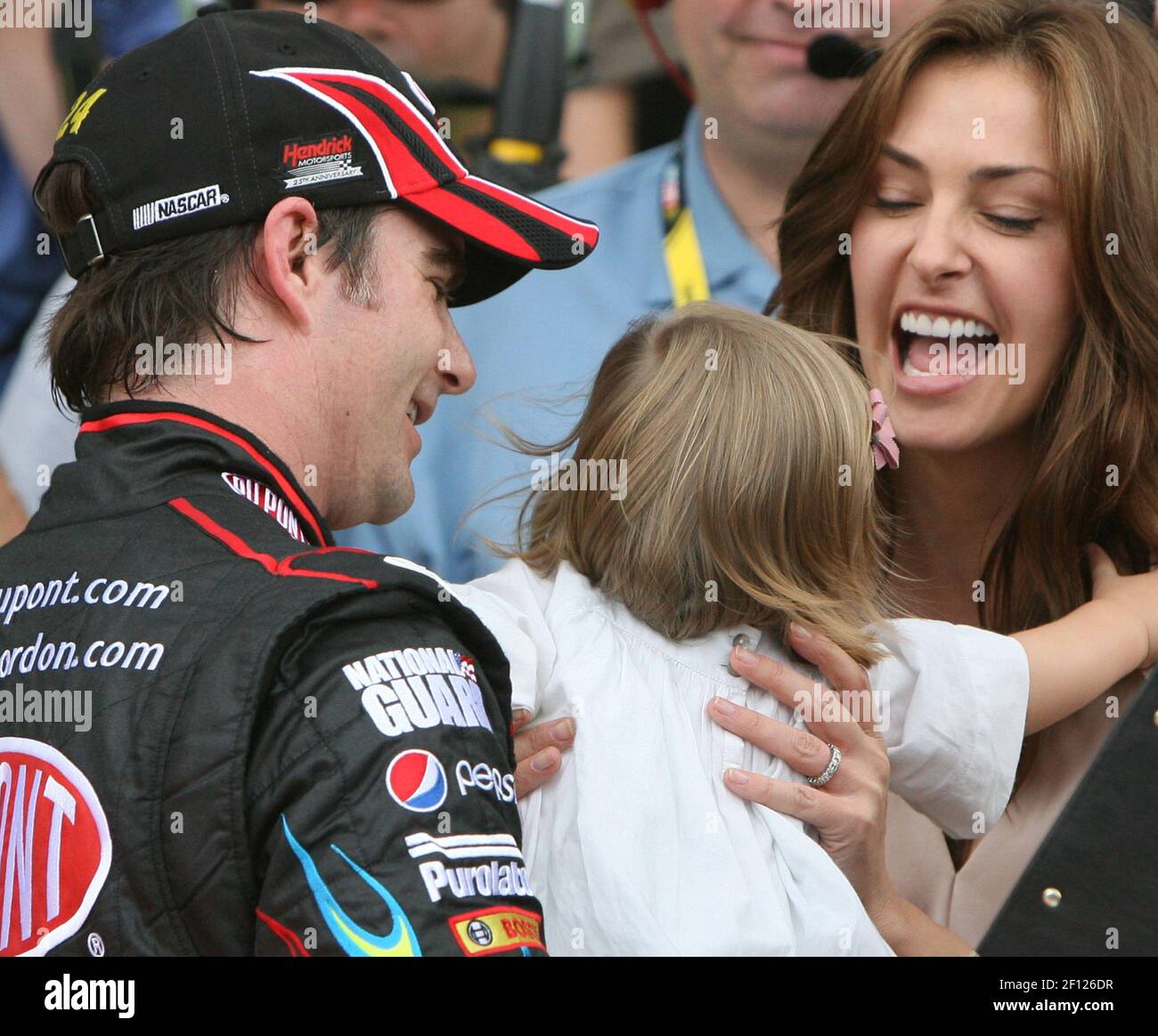 Jeff Gordon, left, driver of the No. 24 DuPont Chevrolet, celebrates ...