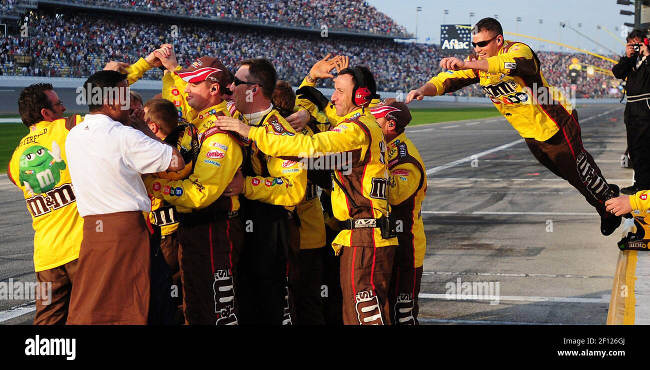 NASCAR driver Kyle Busch's pit crew celebrates his victory in the ...