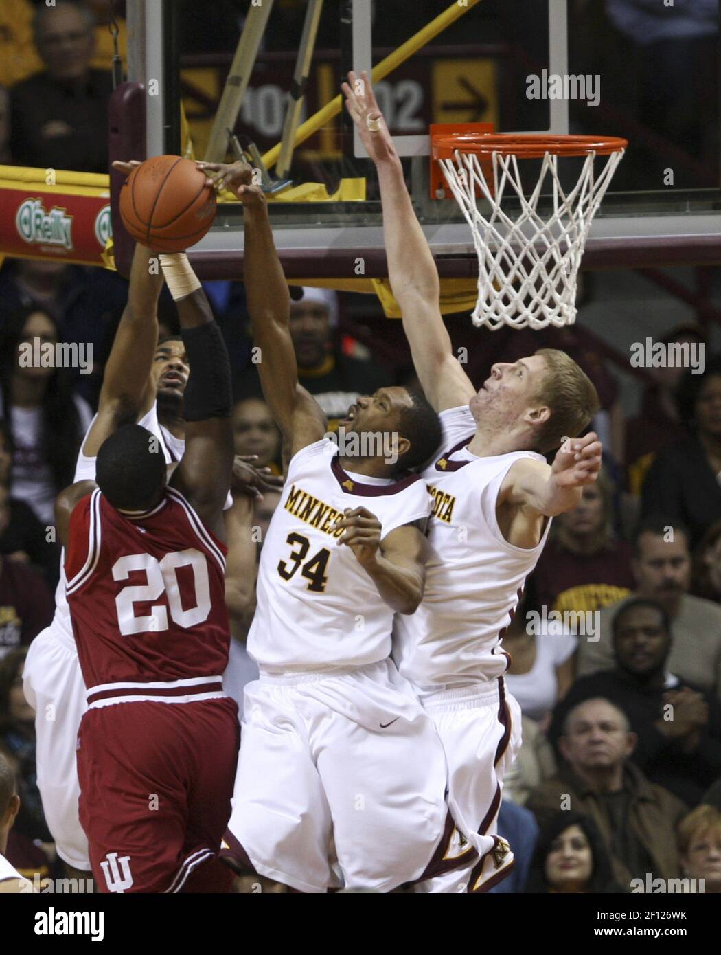 Minnesota's Ralph Sampson III, Damian Johnson, and Colton Iverson, from ...