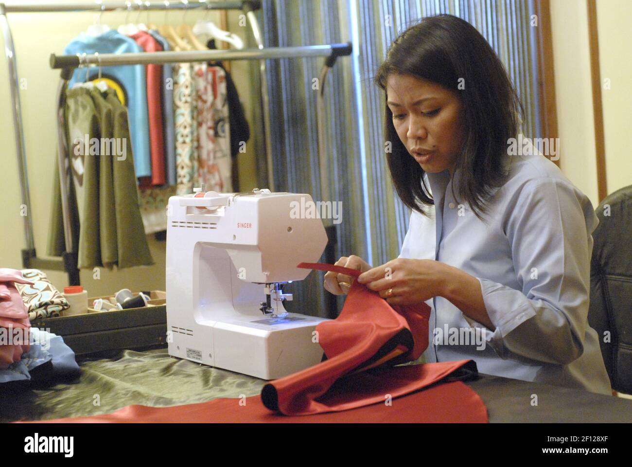 Mimi Sweeney, the owner of Baby Leo Designs, creates satin capes for ...