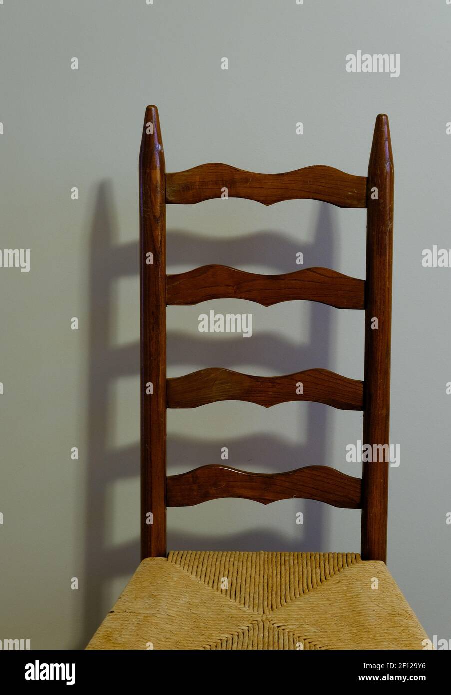 Shadow of Ladder Back Chair Stock Photo - Alamy