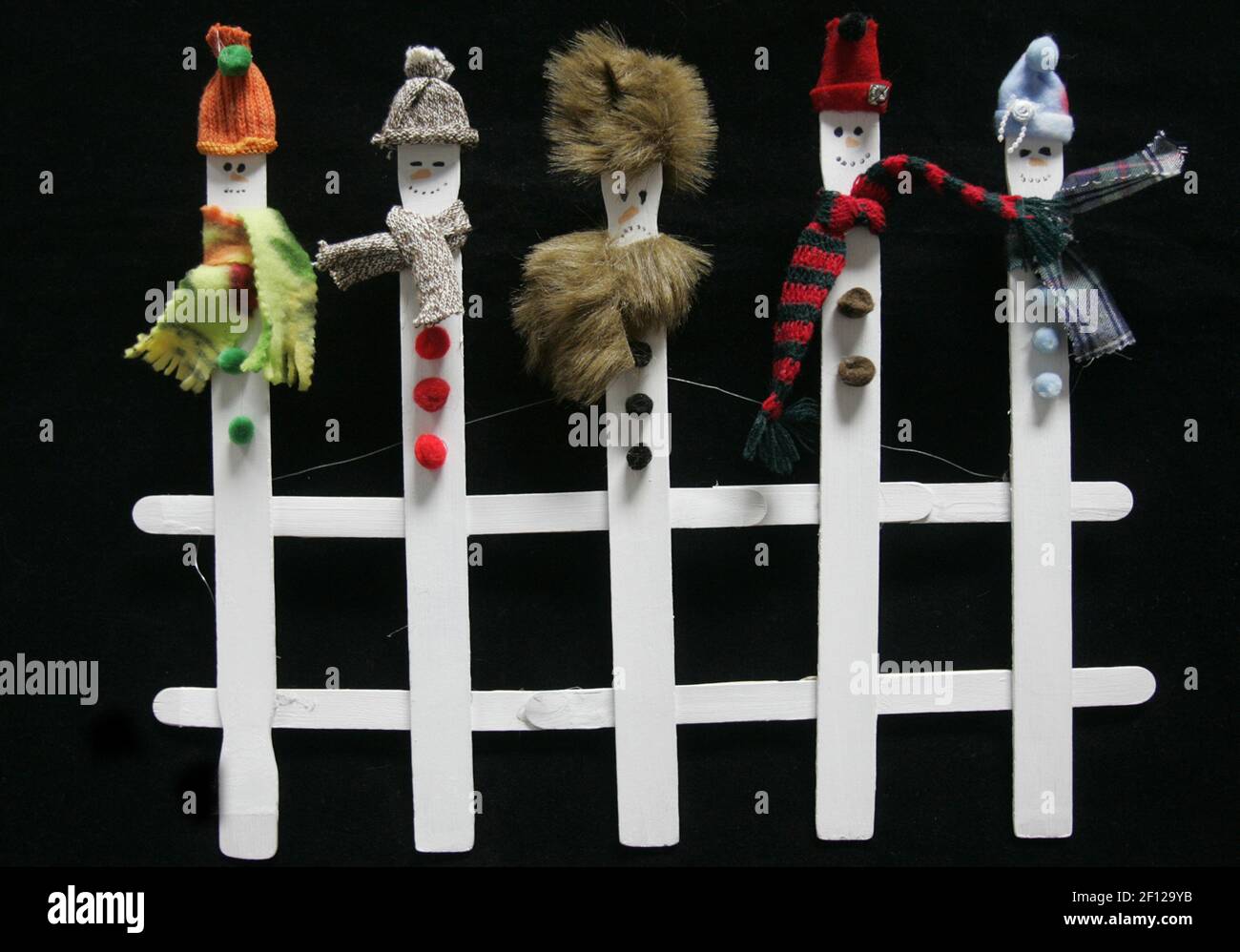 A snowmen fence is a crafty project for the kids on a cold winter's day ...